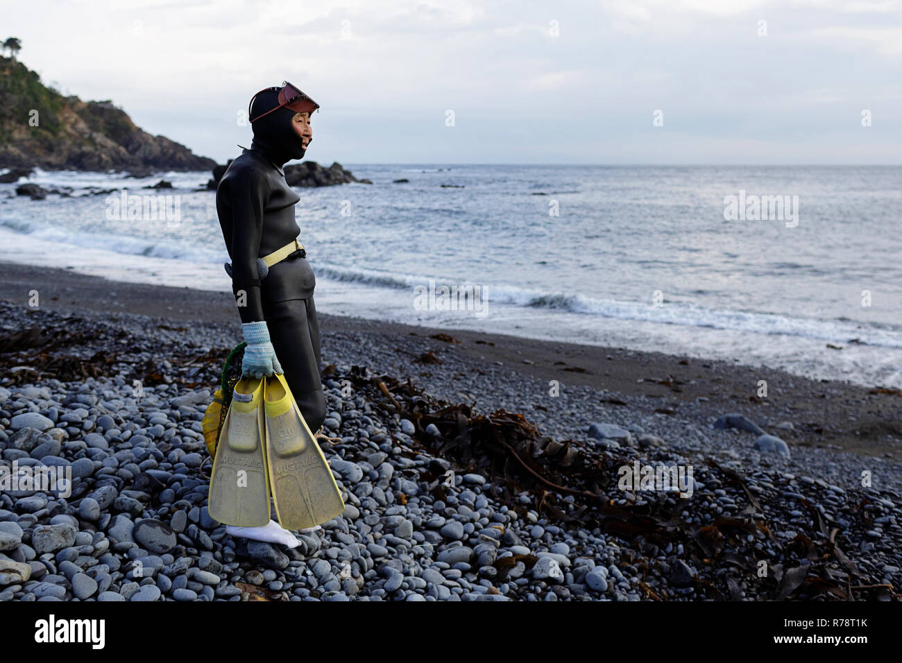 Woman diver standing hi-res stock photography and images - Alamy