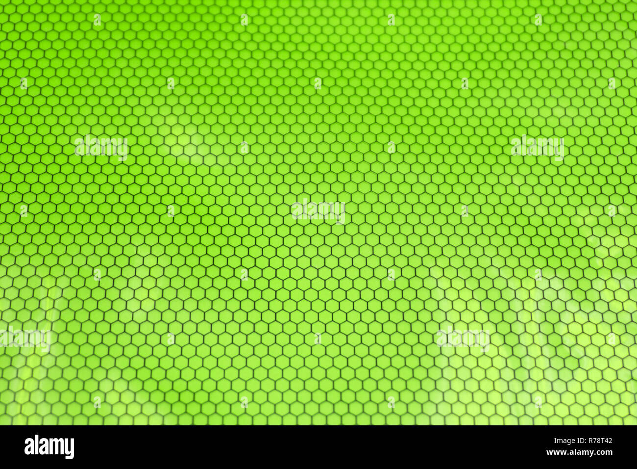 defocused image of yellow color glass as a hive background image Stock ...