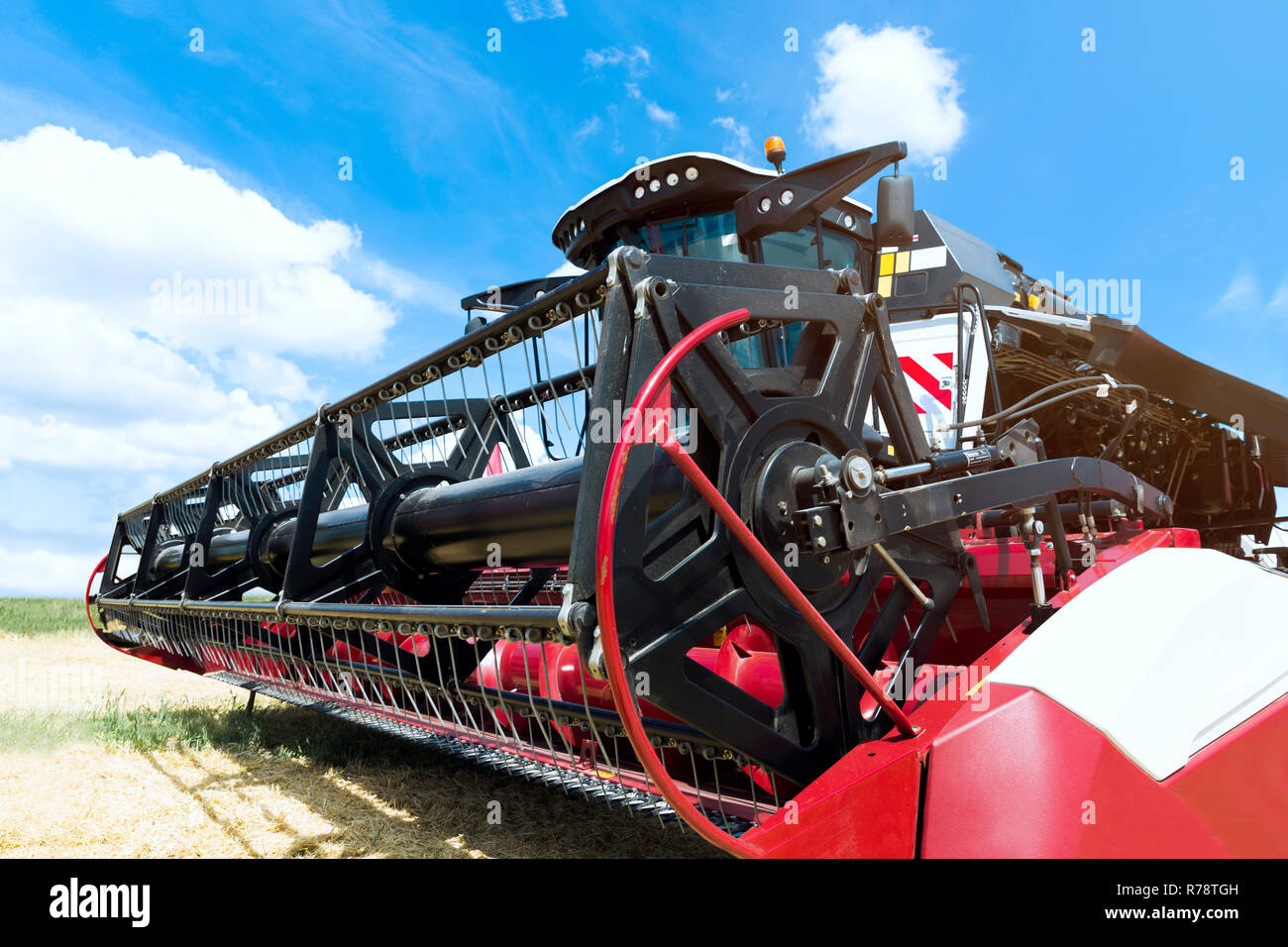 Combine harvester draper head. Agriculture heavy machinery Stock Photo ...