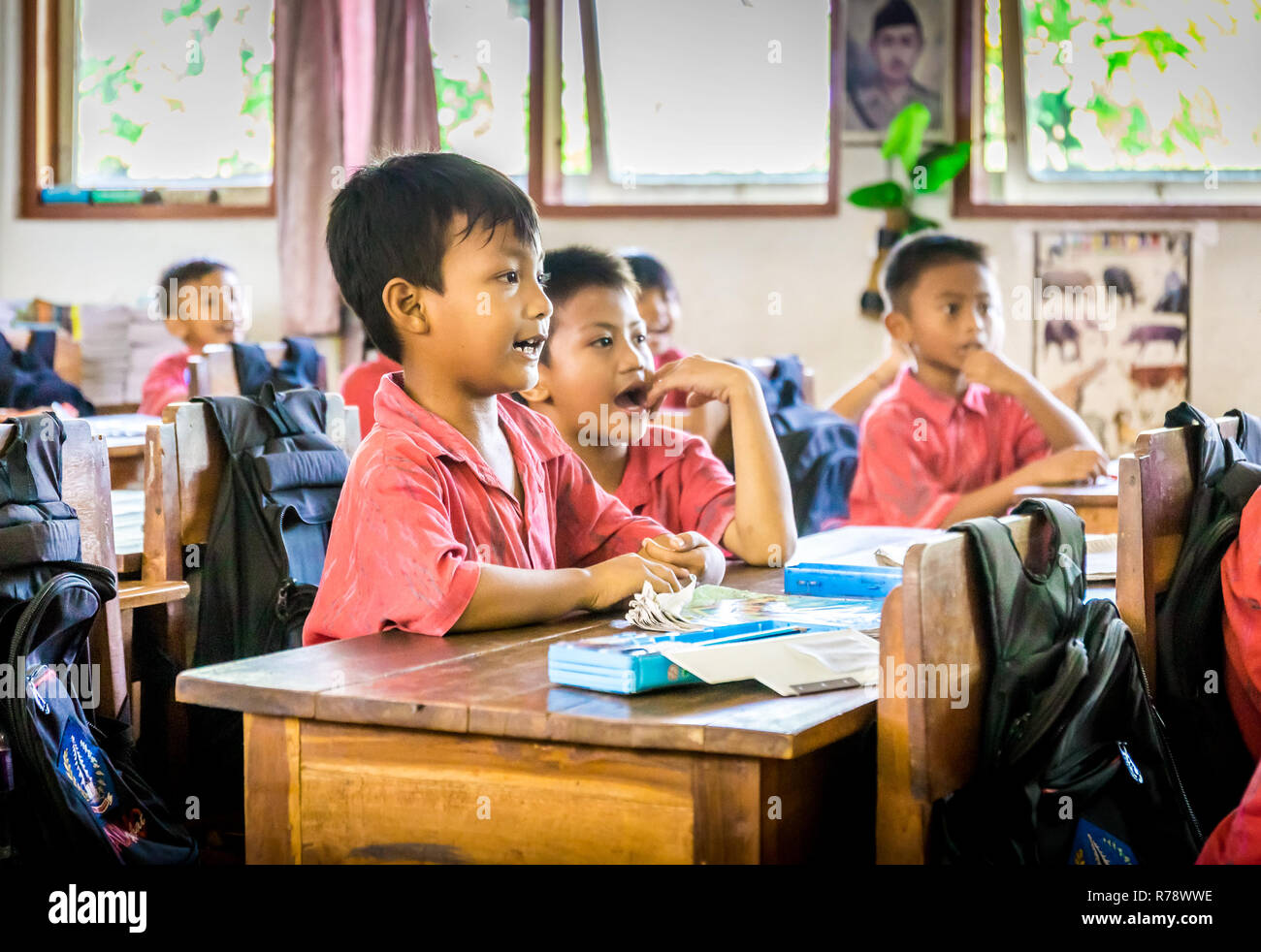BALI, INDONESIA - APRIL 25, 2018: Young happy pupils wearing balinese ...