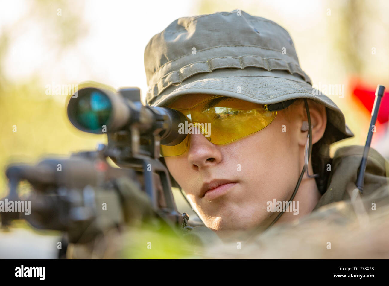 Sniper armed with large caliber, sniper rifle, shooting enemy targets ...