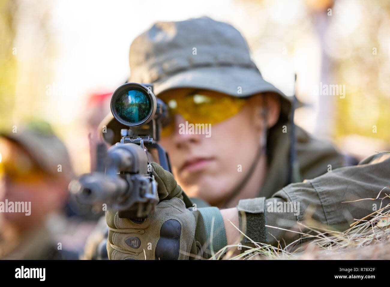 Sniper armed with large caliber, sniper rifle, shooting enemy targets ...