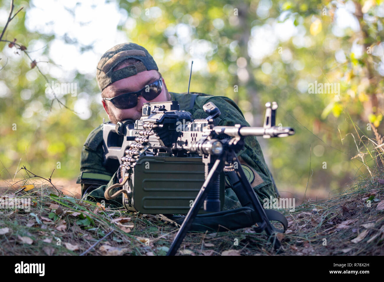 Sniper armed with large caliber, sniper rifle, shooting enemy targets ...