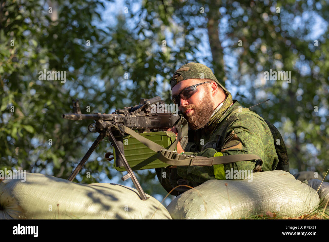 Sniper armed with large caliber, sniper rifle, shooting enemy targets ...