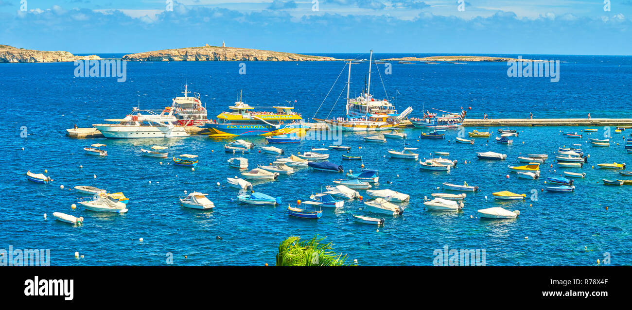 BUGIBBA, MALTA - JUNE 14, 2018: The pleasure boats offer the tourist ...