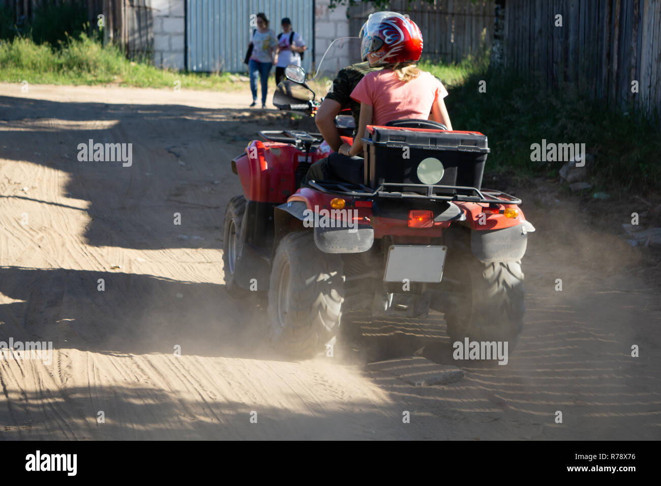 Man on the ATV Quad Bike on the mountains road Stock Photo - Alamy