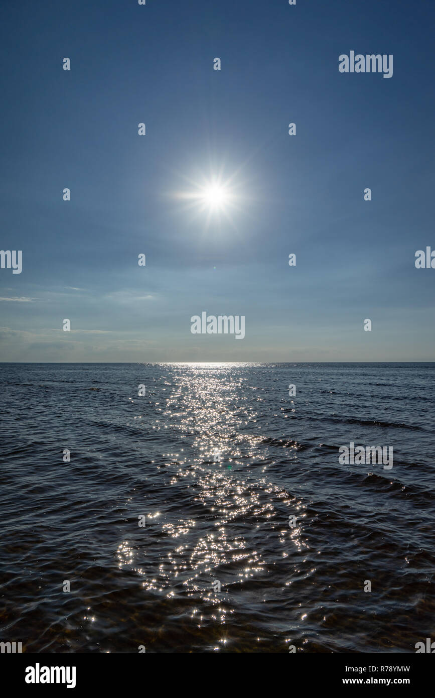 colorful sunset or sunrise in the sea with bright colors and dramatic ...