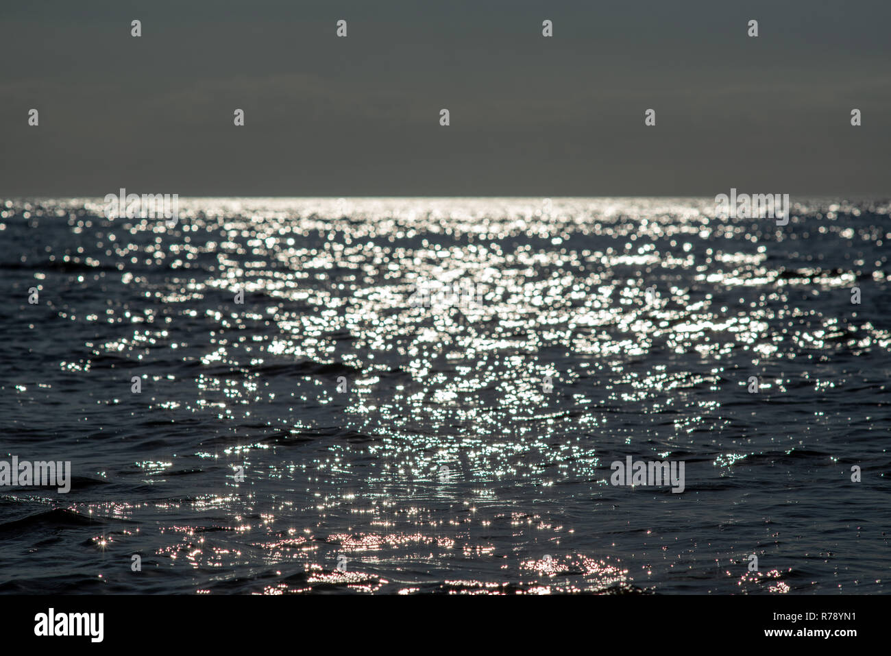 colorful sunset or sunrise in the sea with bright colors and dramatic ...