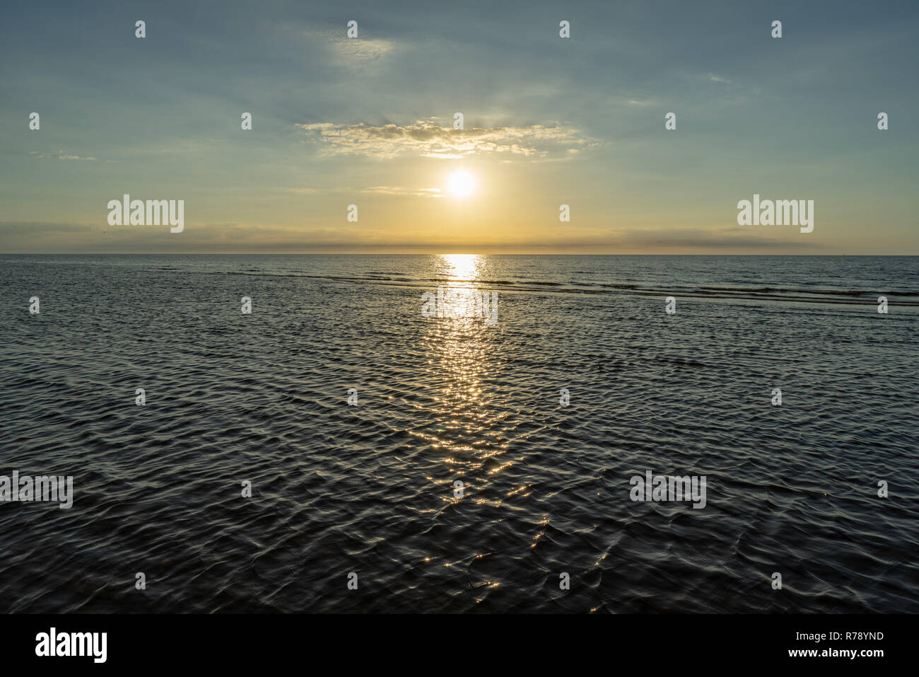 colorful sunset or sunrise in the sea with bright colors and dramatic ...