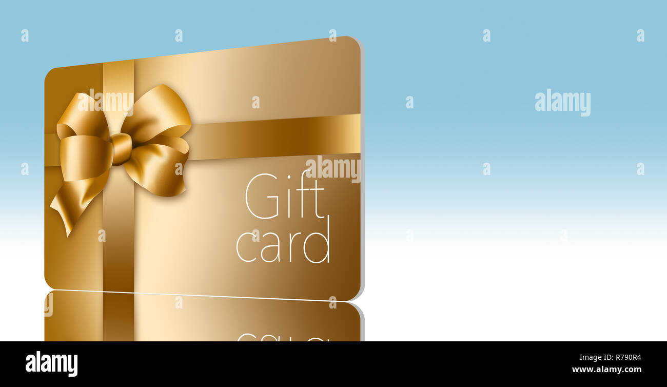 A gold gift card with a gold bow and ribbon is pictured here isolated ...