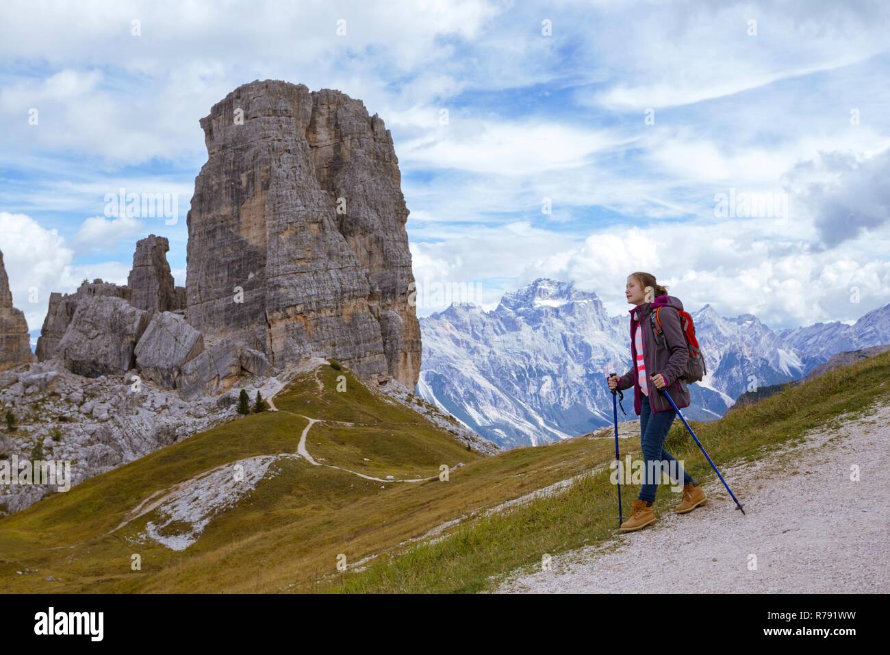 girl hiker at the mountains Dolomites, Italy. Cinque Torri Stock Photo ...