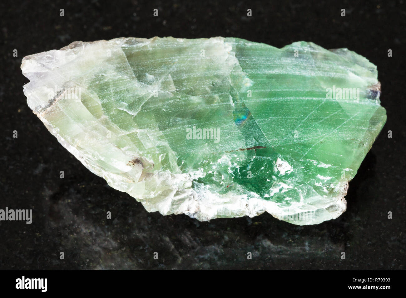 slab from green Beryl gemstone on black Stock Photo - Alamy