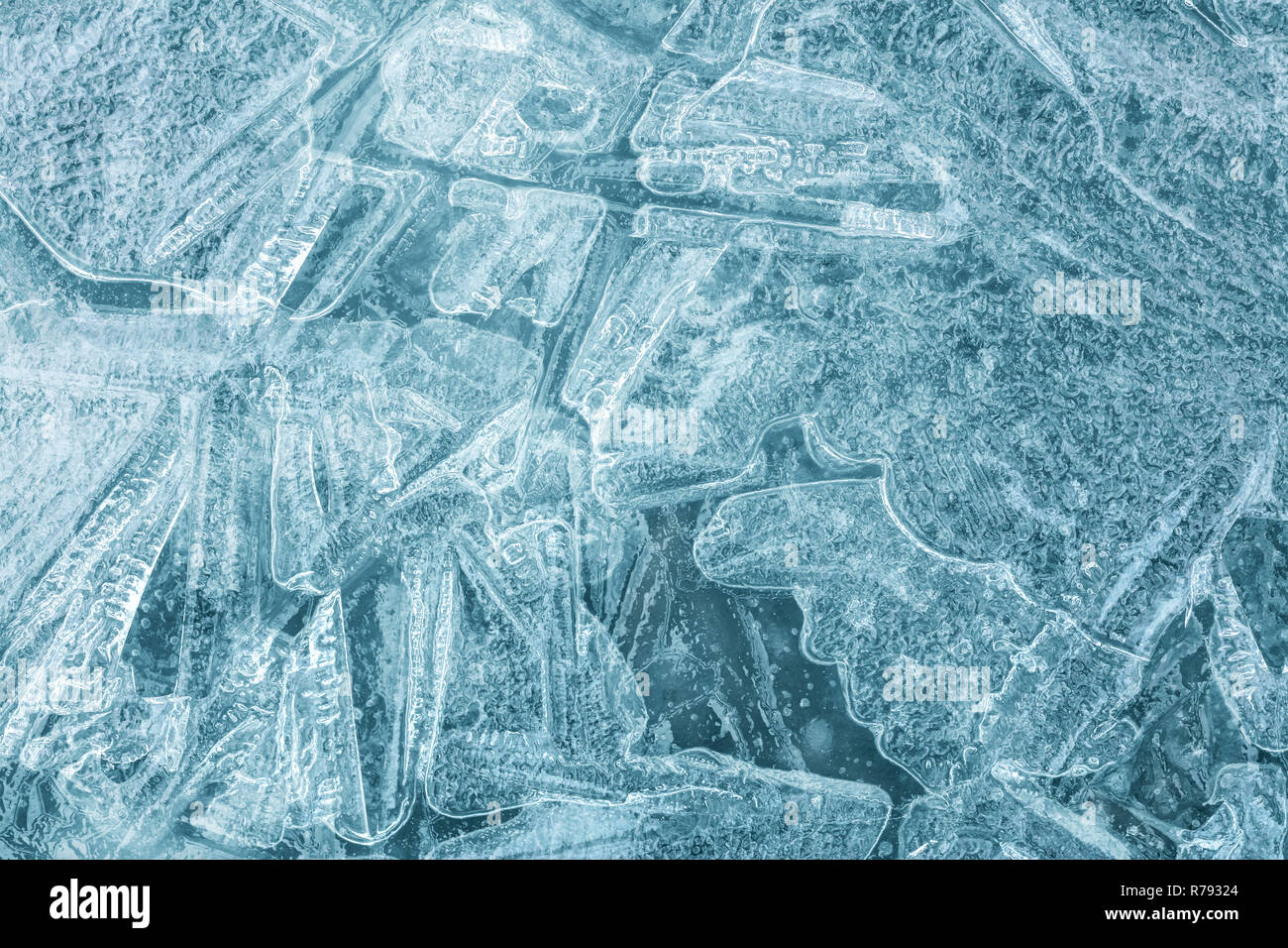 Frozen river surface covered with ice, macro view. Natural winter ...