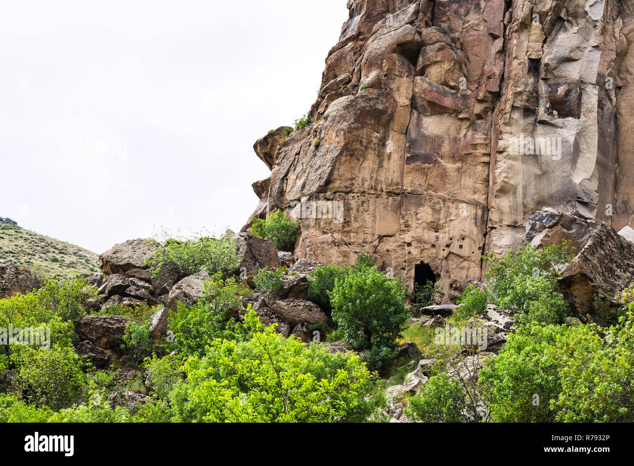 slope with ancient cave houses in Ihlara Valley Stock Photo - Alamy