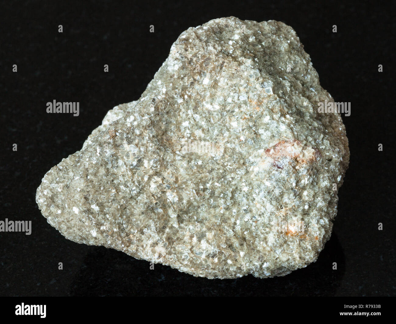 muscovite greisen rock with spessartine on black Stock Photo - Alamy