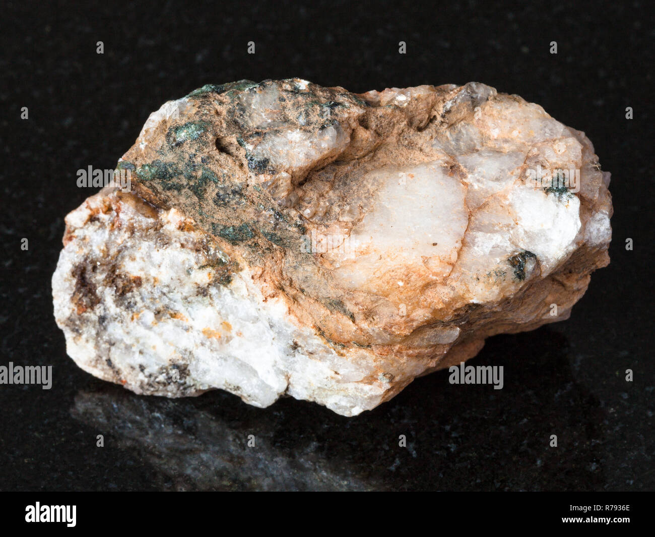 raw Albite stone on black Stock Photo - Alamy