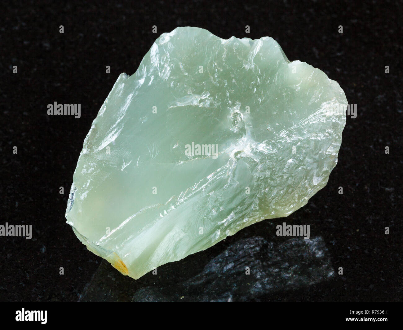 raw Prase (green quartz) stone on black Stock Photo - Alamy