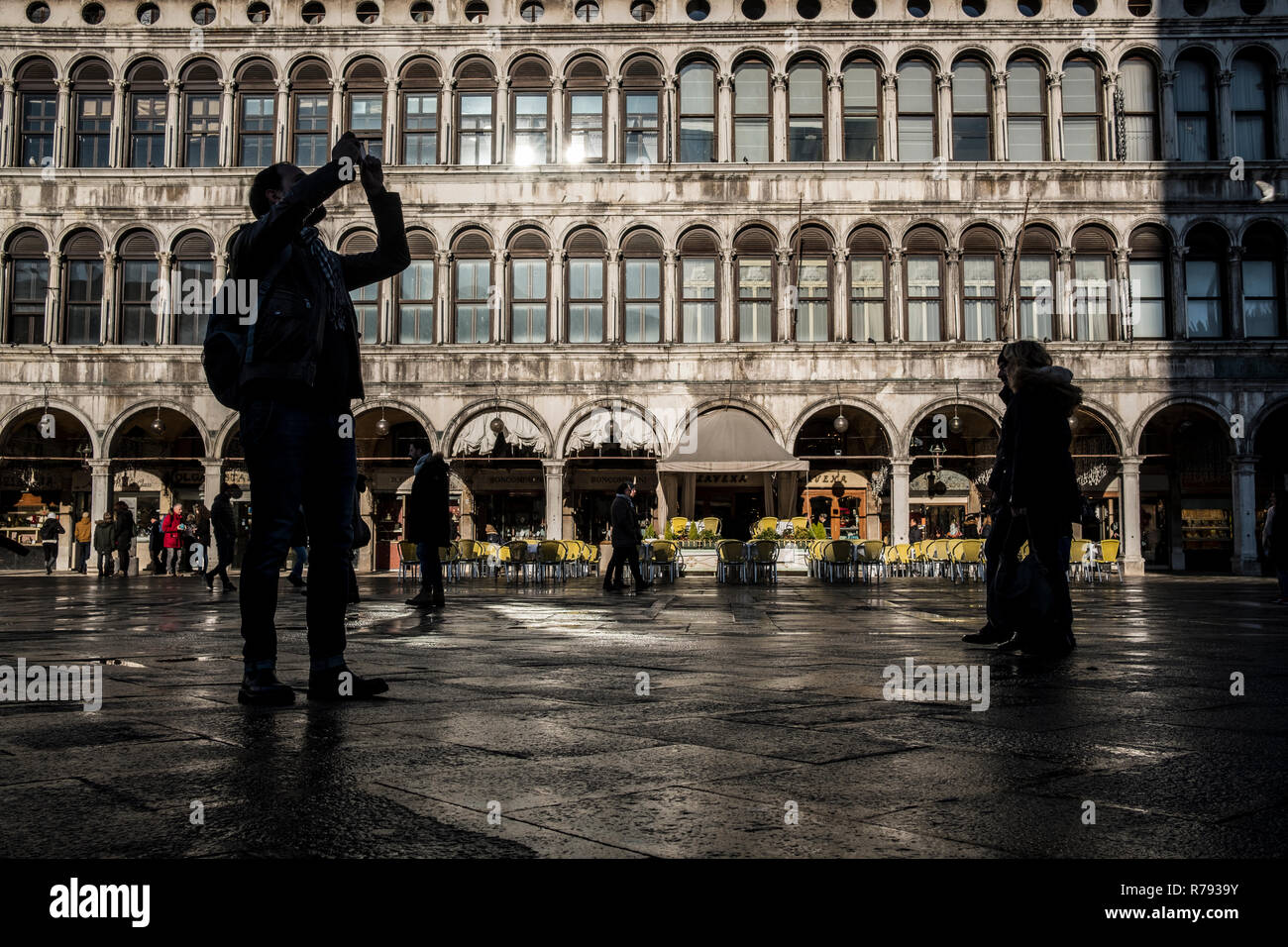 Venice, Portugal - 9 December 2017: Man taking a photo at Piazza San ...