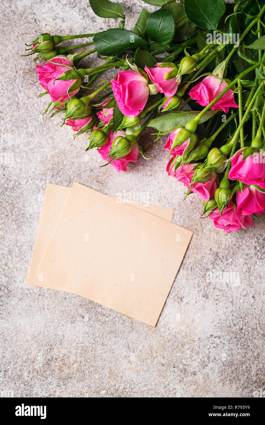 Pink roses and greeting card Stock Photo - Alamy