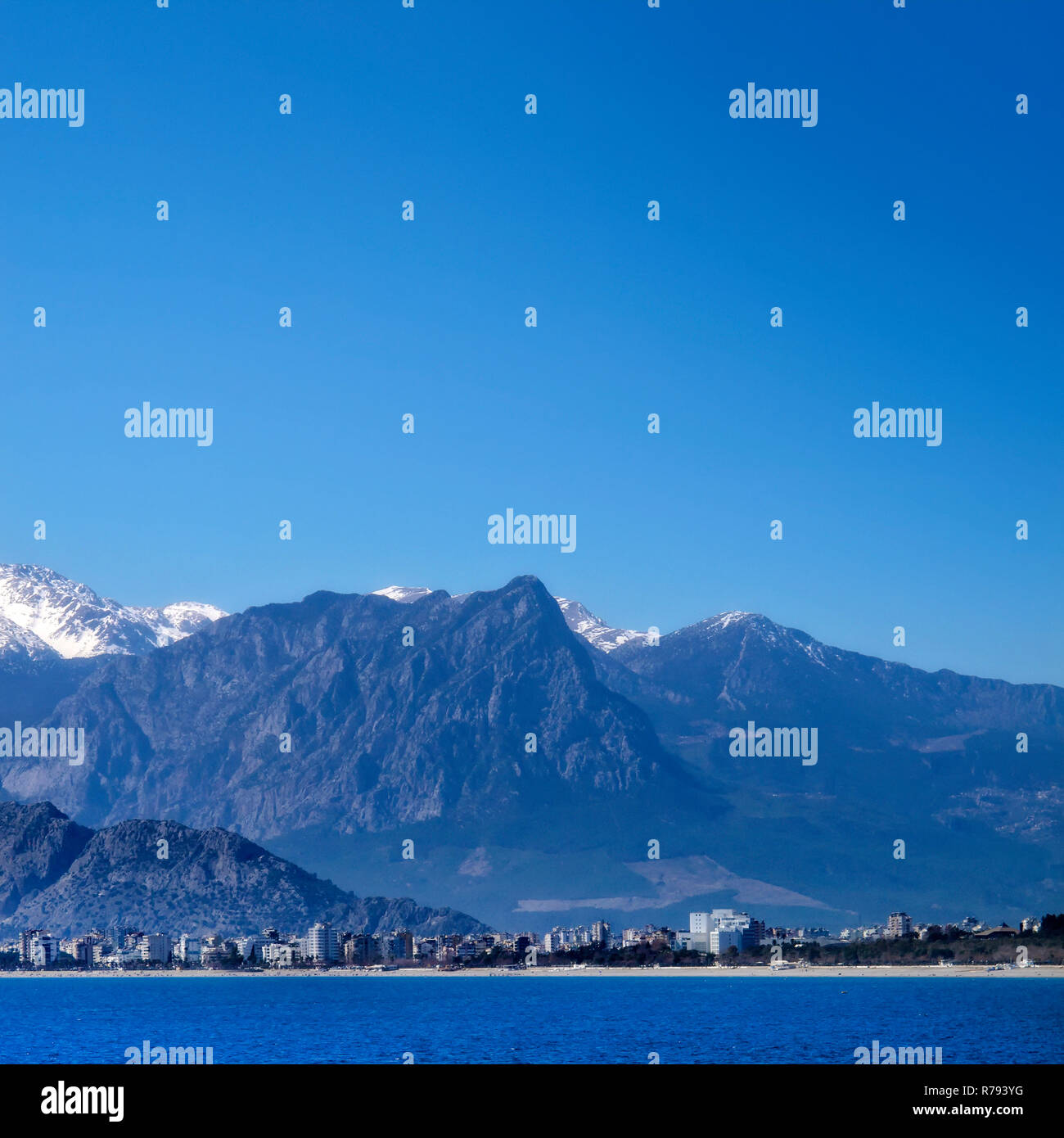 mountains over clear blue sky Stock Photo - Alamy