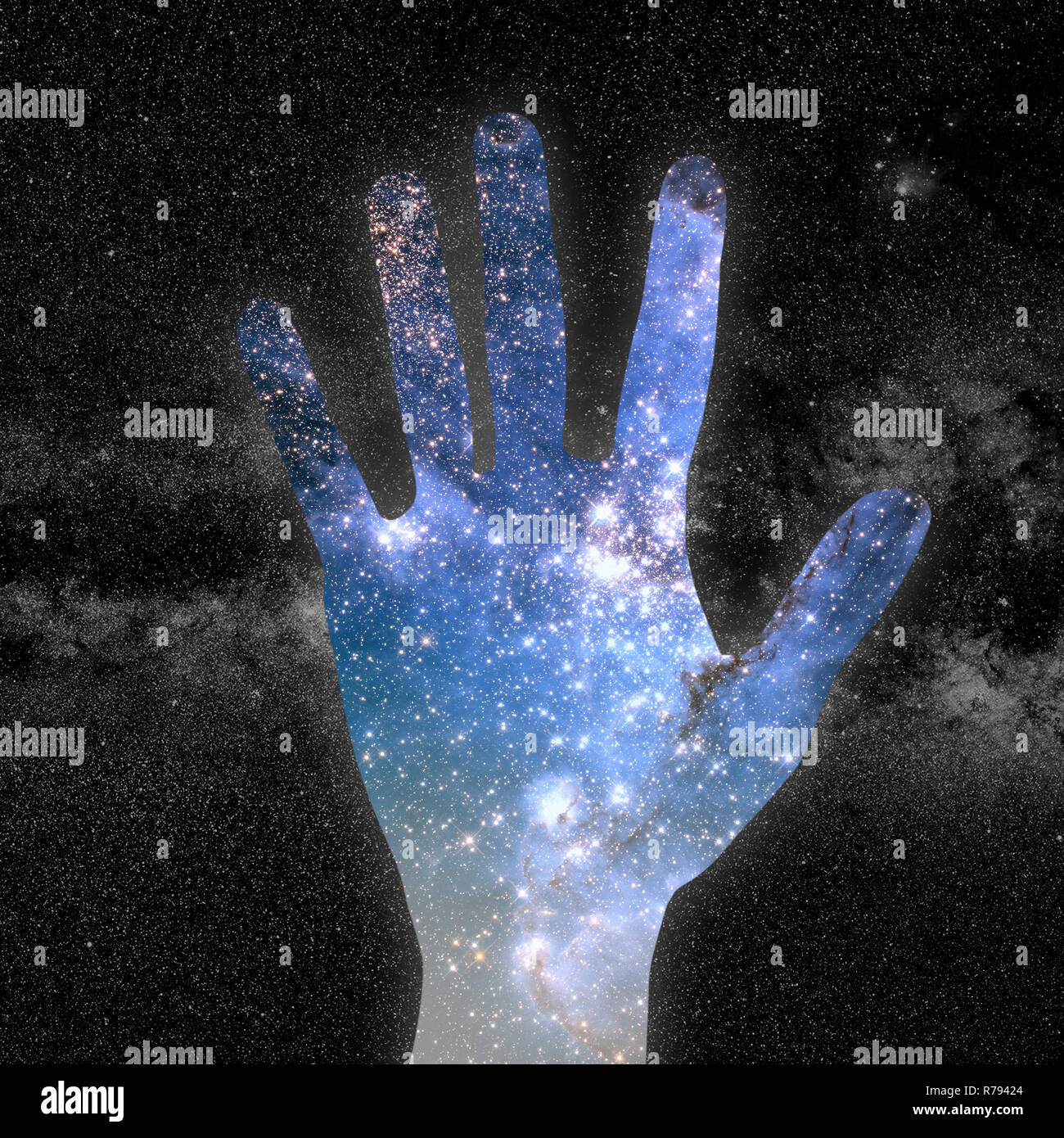 hand and universe Stock Photo - Alamy