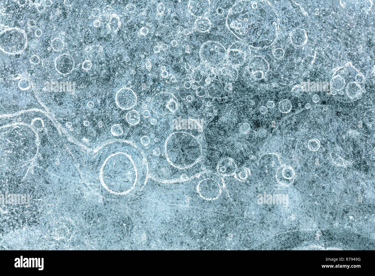 Bubbles and cracks in ice block texture. Winter textured icy background ...