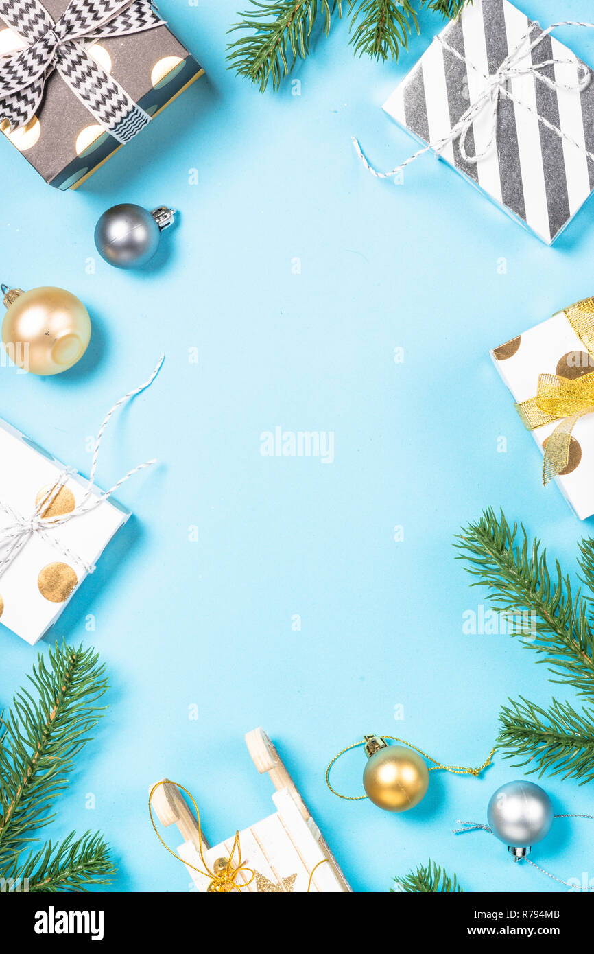 Christmas background - fir tree and decorations on blue top view Stock ...