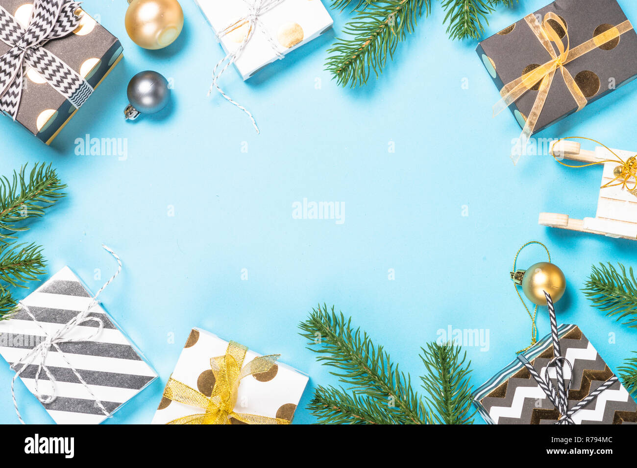 Christmas flatlay background - fir tree and decorations on blue Stock ...