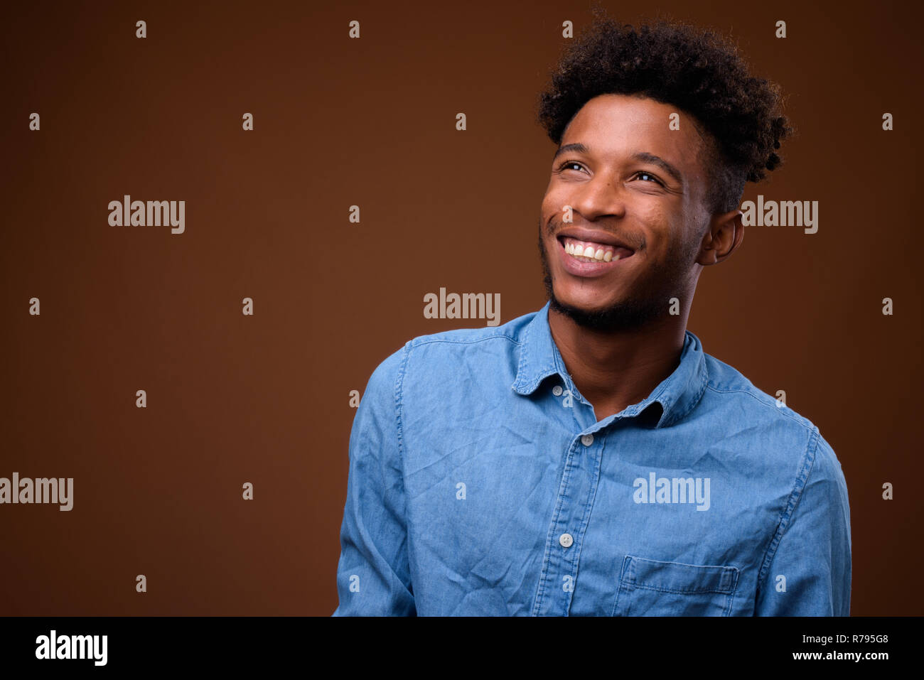 Handsome black man smiling face hi-res stock photography and images - Alamy