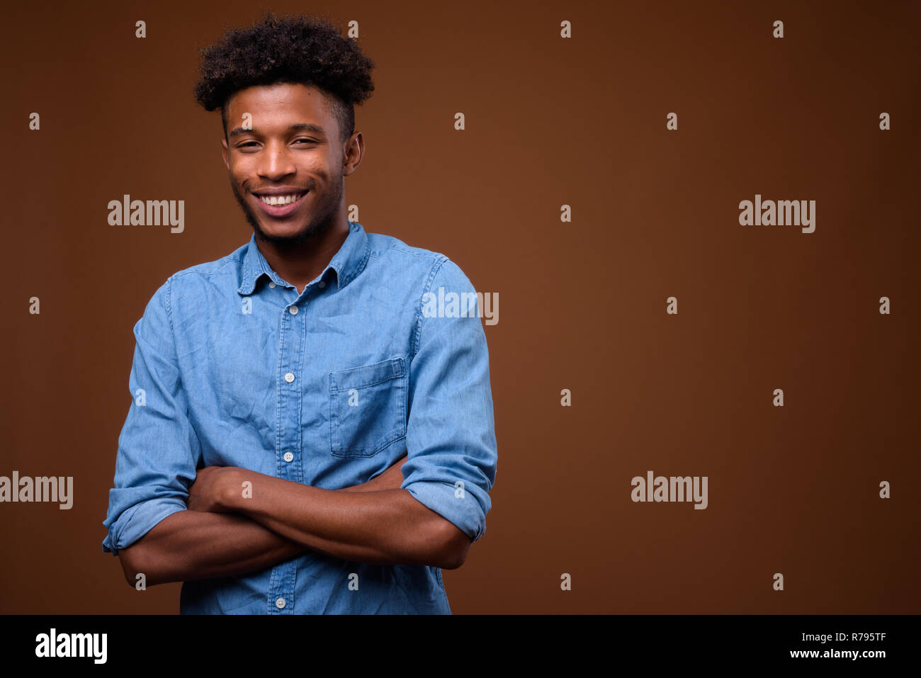 Happy african guy hi-res stock photography and images - Alamy