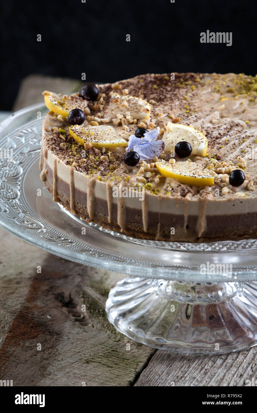 Delicious raw vegan cake with lovely decorations on it Stock Photo - Alamy