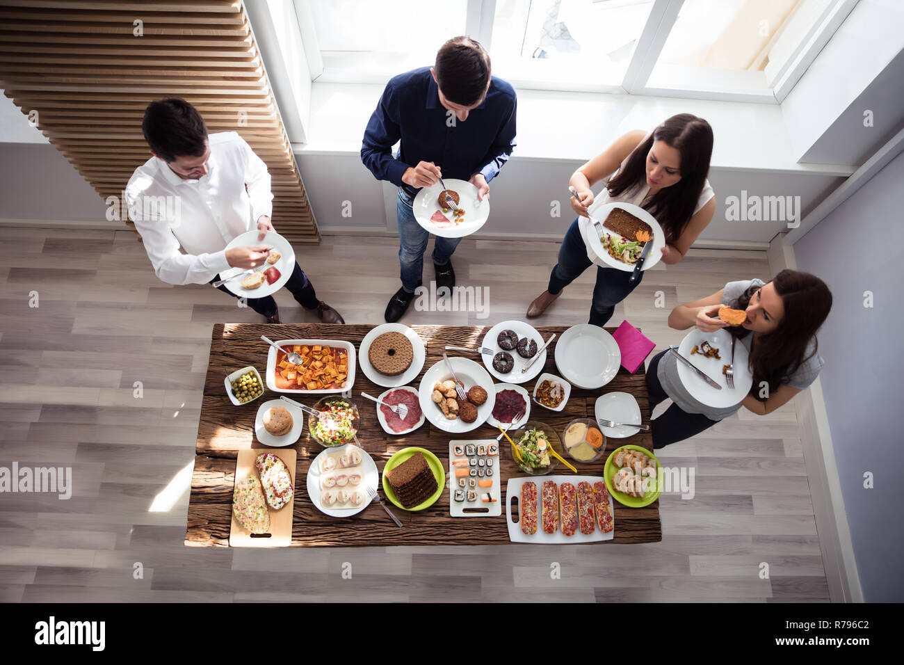 Friends Eating Lunch Together Stock Photo - Alamy