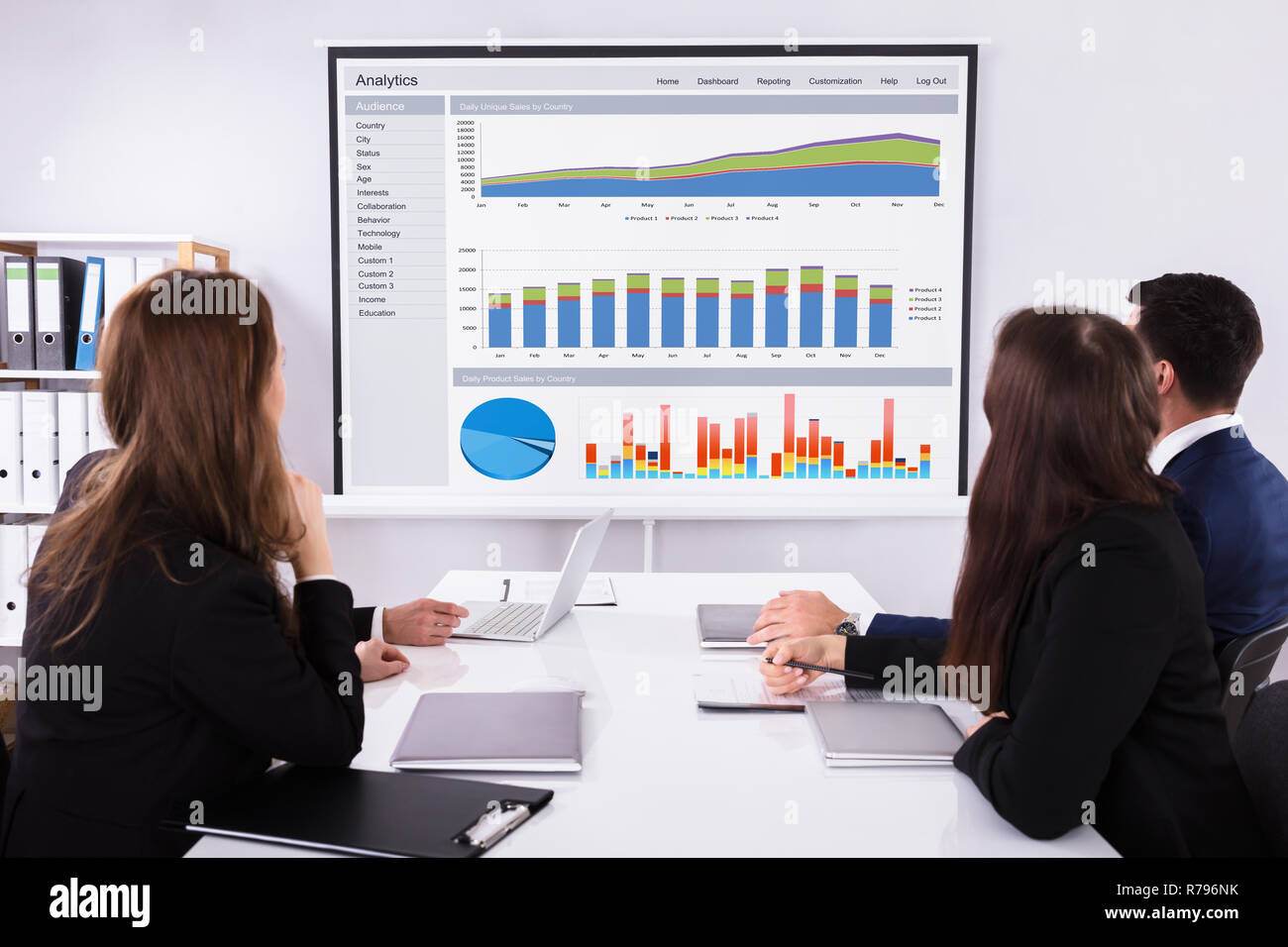 Businesspeople Looking At Graphs Stock Photo - Alamy