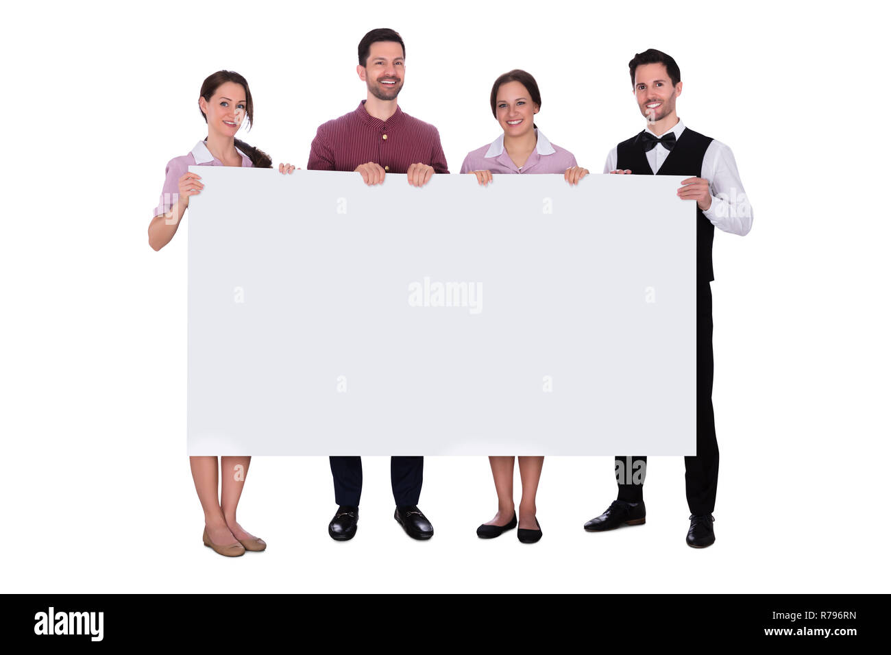 Smiling Staff Holding Billboard Stock Photo - Alamy