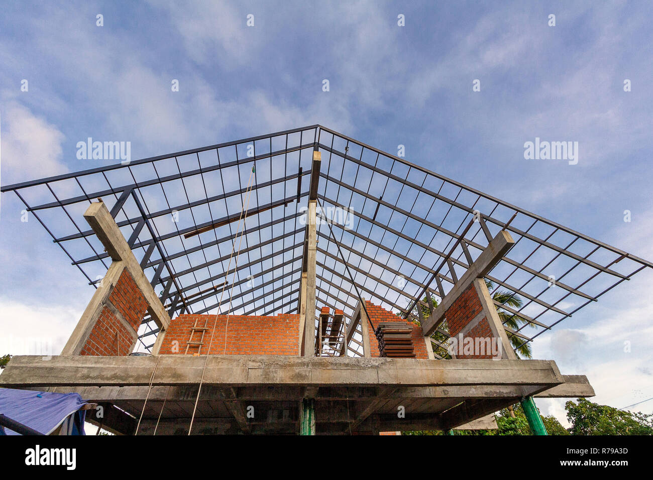 A new house under construction with steel roofing struction, built a ...