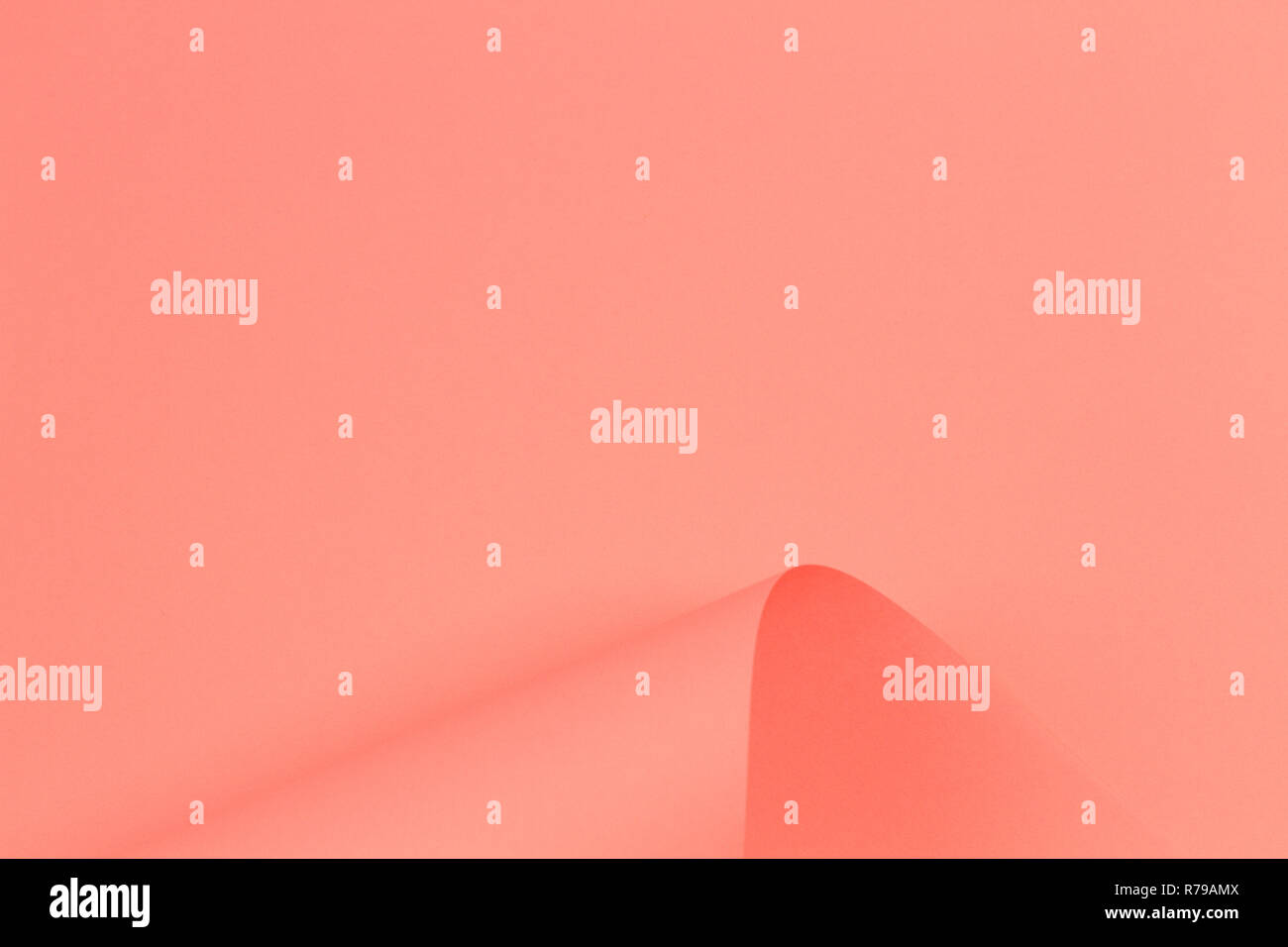 Abstract geometric shape coral color paper background Stock Photo - Alamy