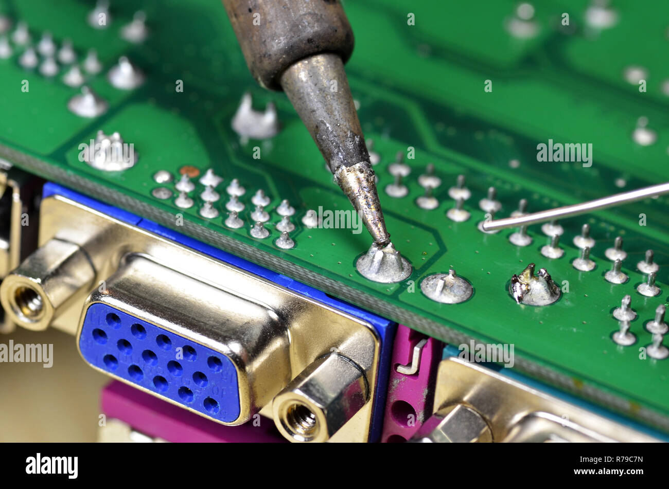 Installation and soldering of electronic components Stock Photo - Alamy