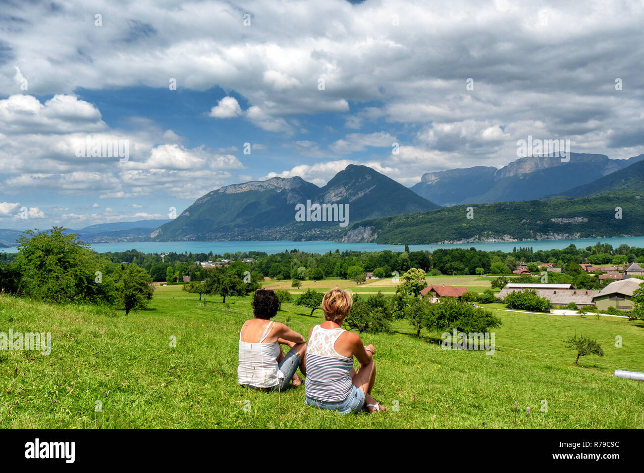 Two women sit on cliff hi-res stock photography and images - Alamy