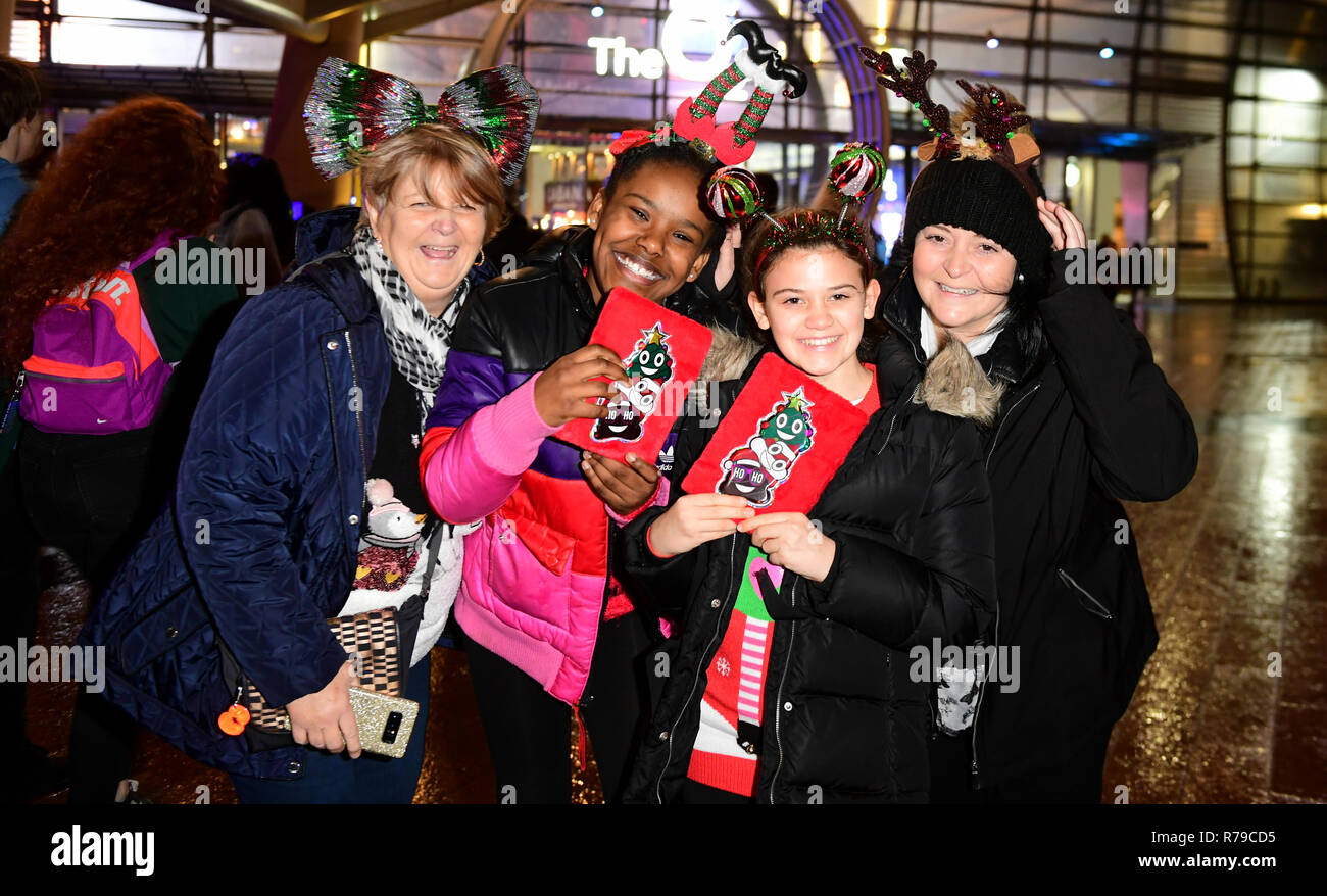 Members of the audience pose outside the O2 Arena during day one of ...