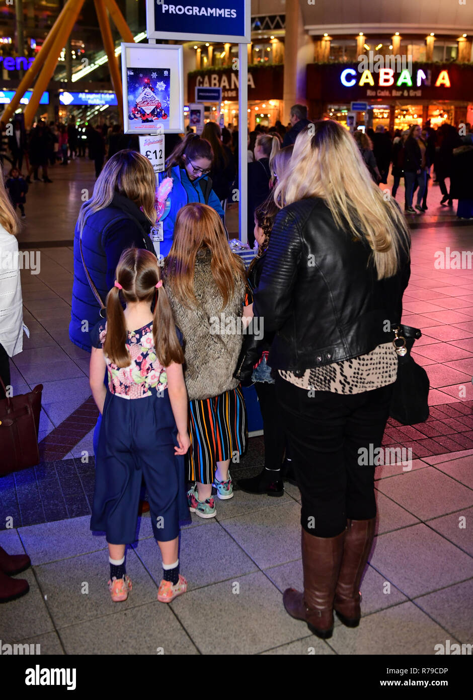 Members of the audience queue for a programme outside the O2 Arena ...