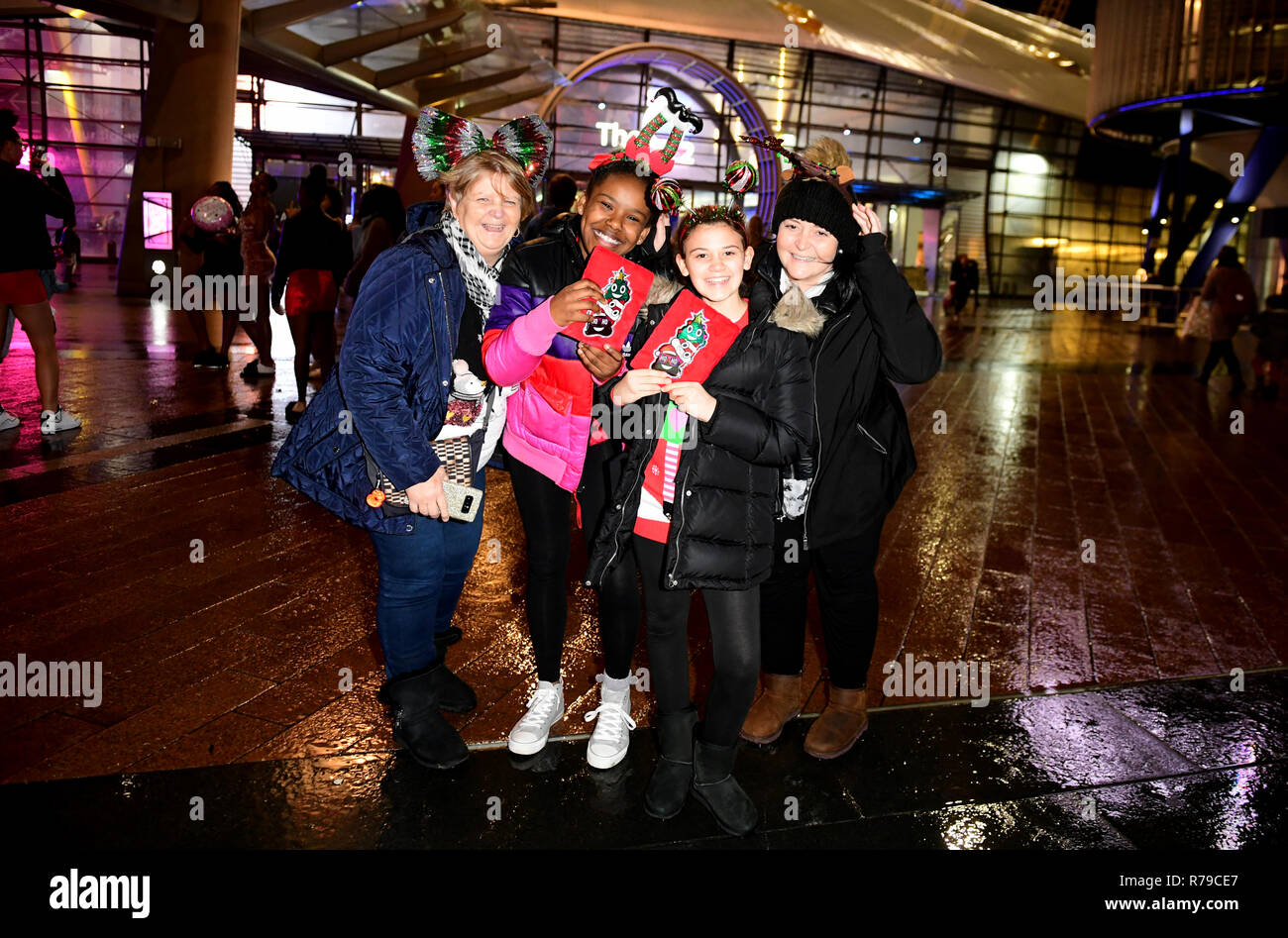Members of the audience pose outside the O2 Arena during day one of ...
