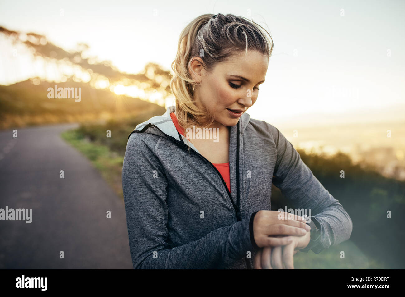 Woman exercise wrist watch hi-res stock photography and images - Alamy