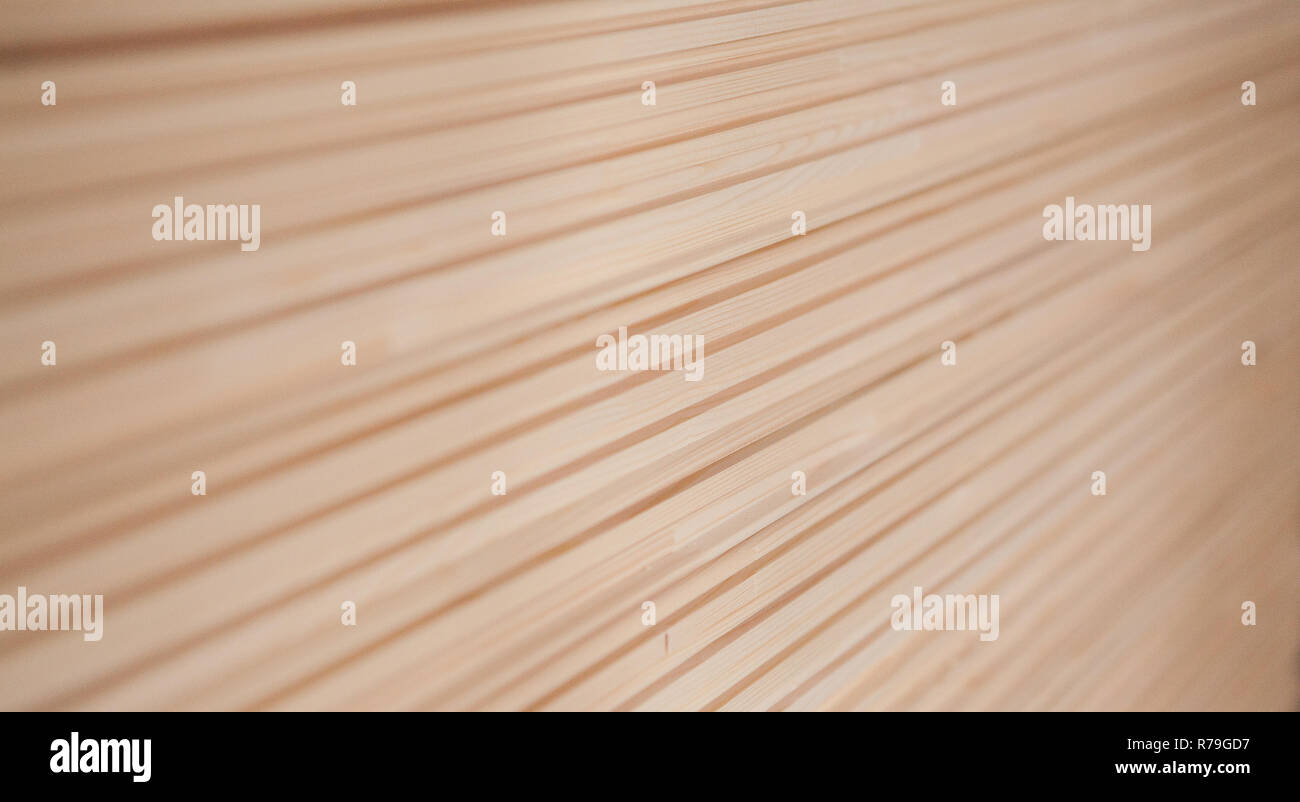 Folded wooden lining in a sawmill. Piled alder boards as texture Stock ...