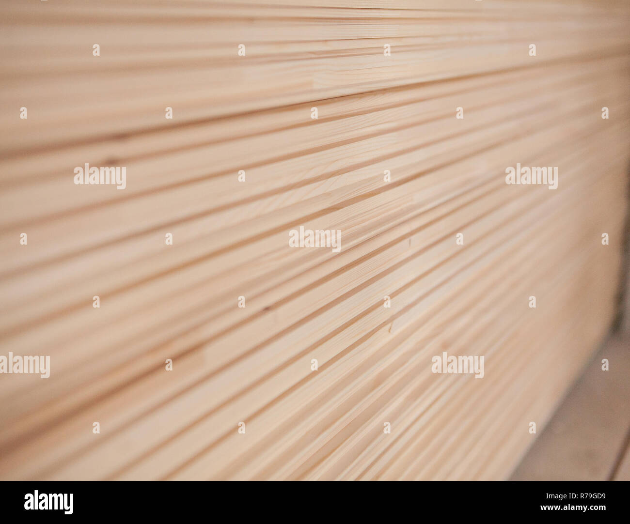 Folded wooden lining in a sawmill. Piled alder boards as texture Stock ...