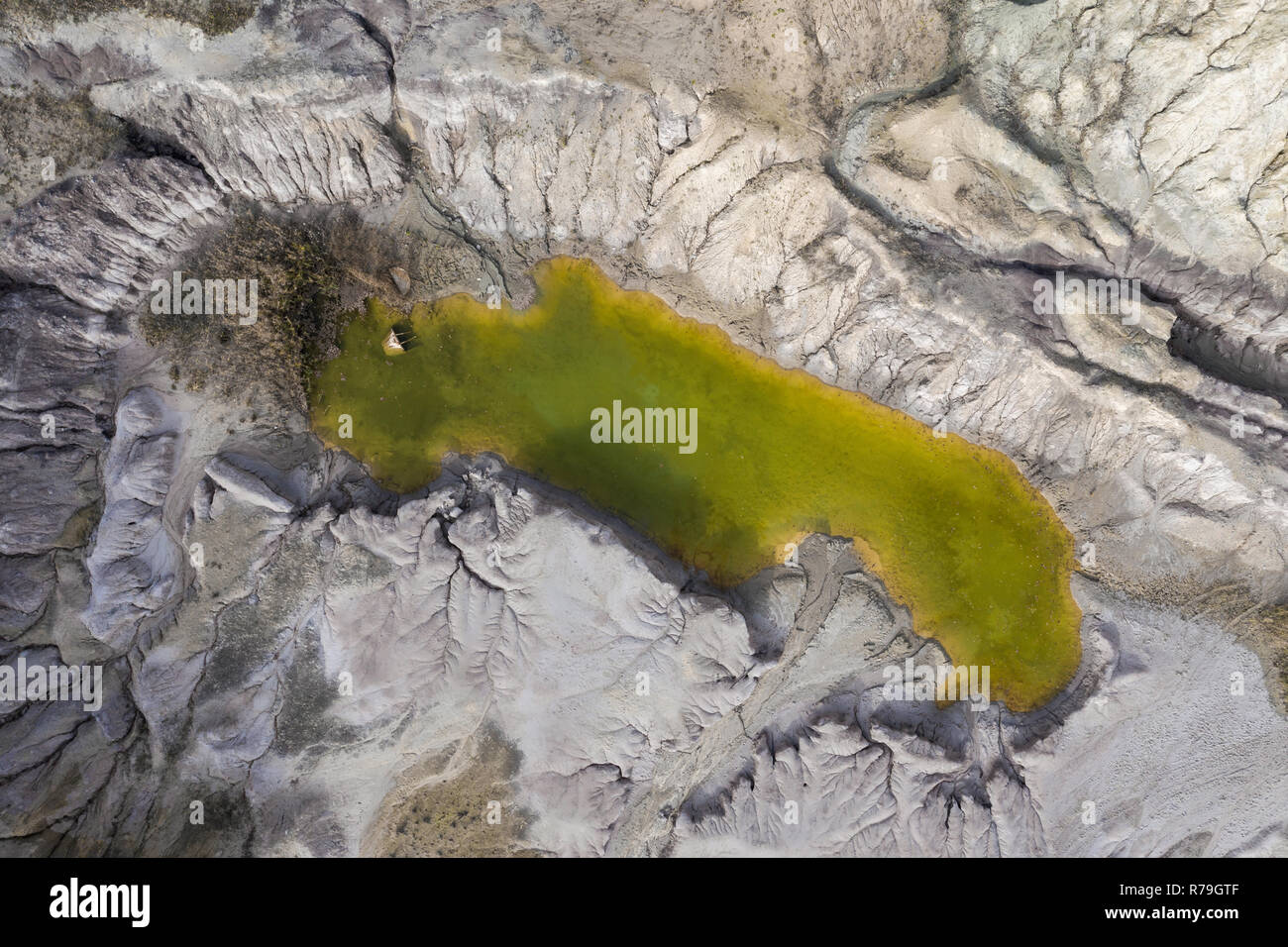 Abandoned industrial mining area. Drone view of opencast mine filled ...