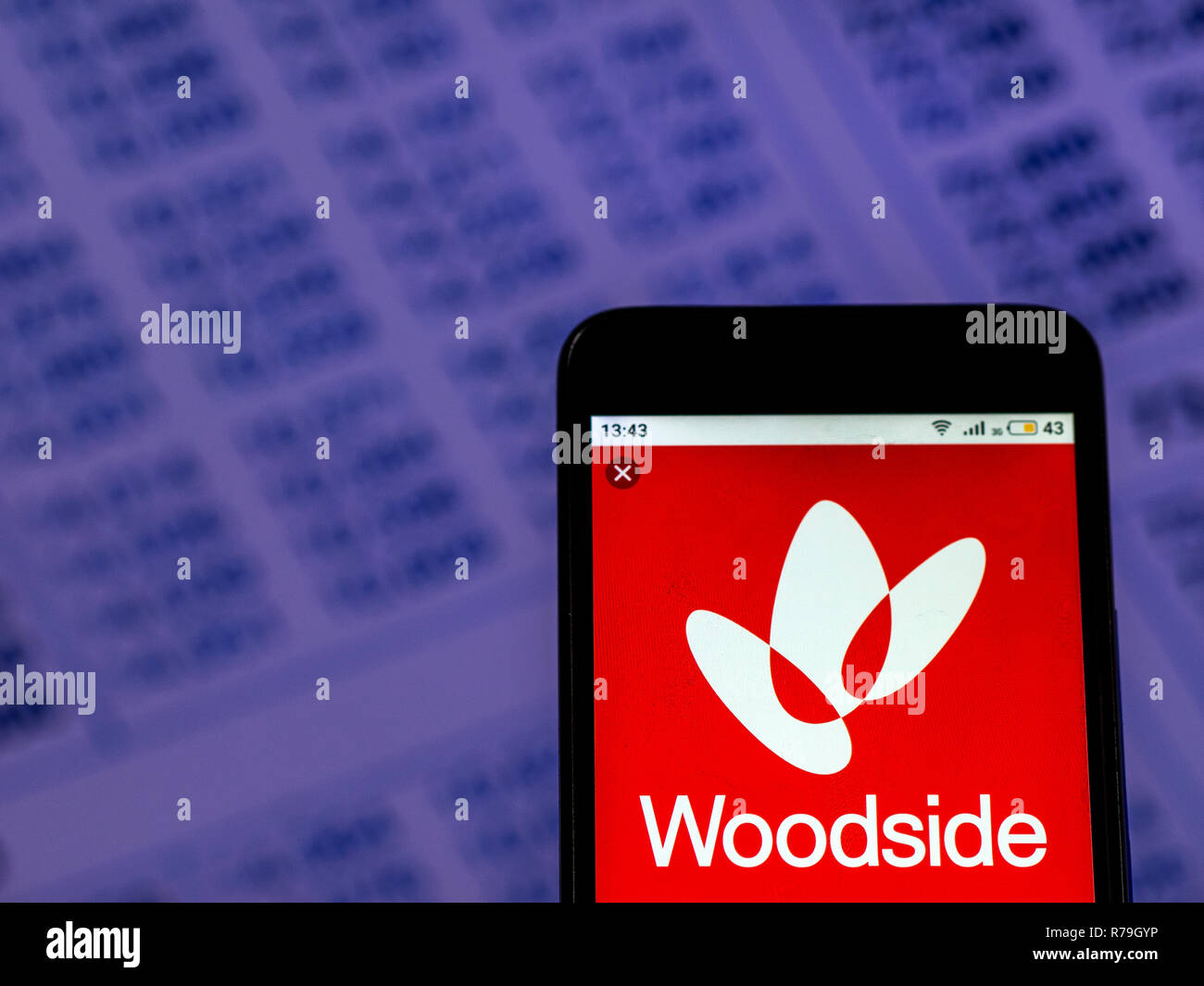 Woodside Petroleum Company logo seen displayed on smart phone Stock ...