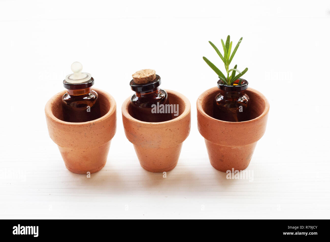 Bottles aromatic essential oil Cut Out Stock Images & Pictures - Alamy