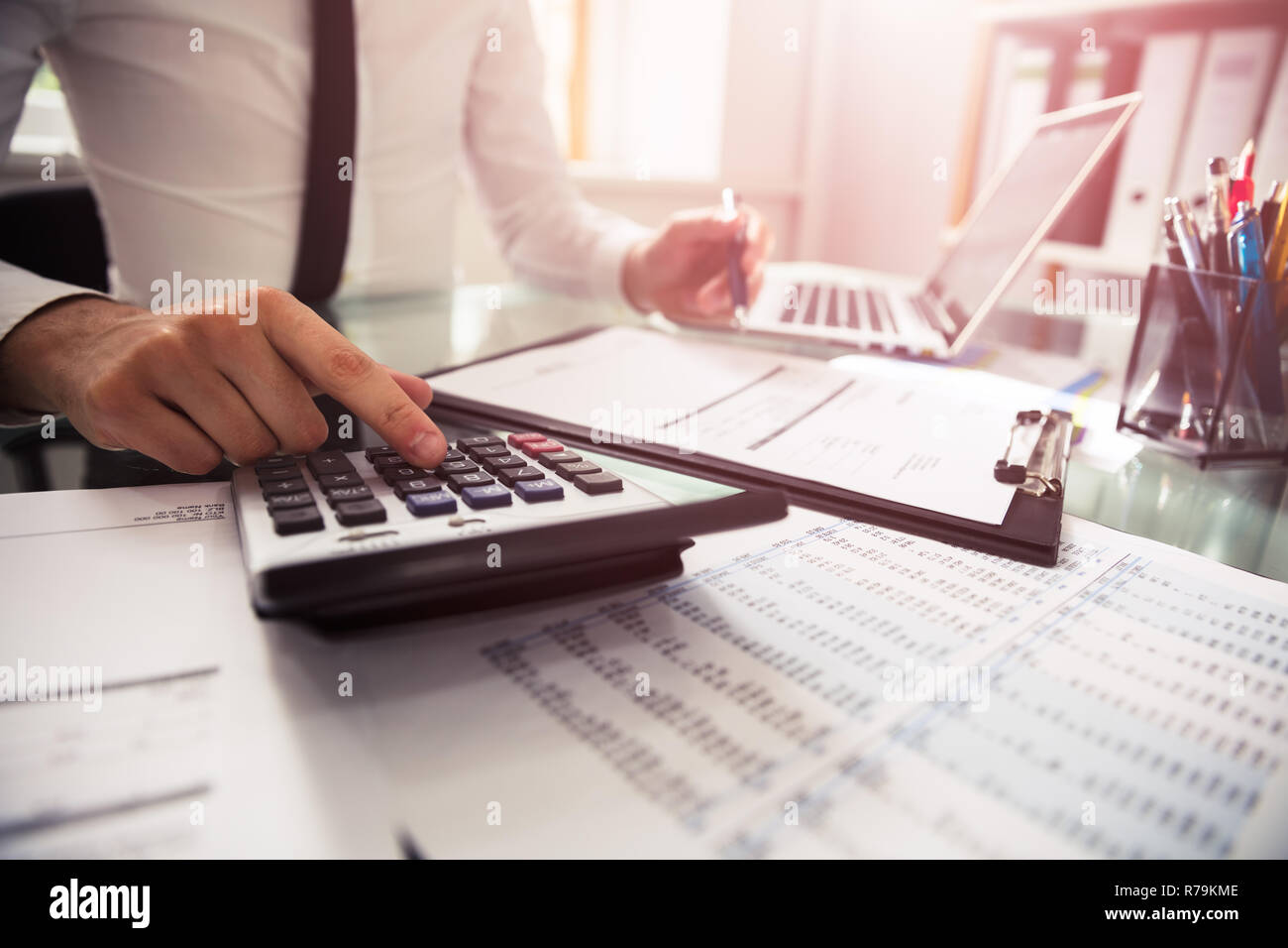 Businessman Checking Invoice Stock Photo - Alamy