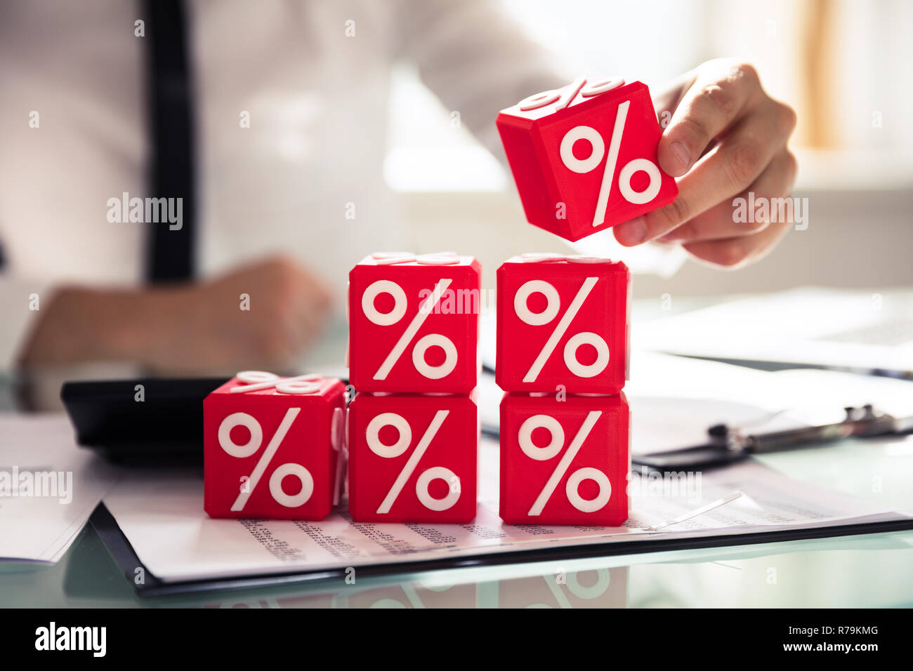 Businessperson Building Cubic Blocks With Percentage Symbols Stock ...