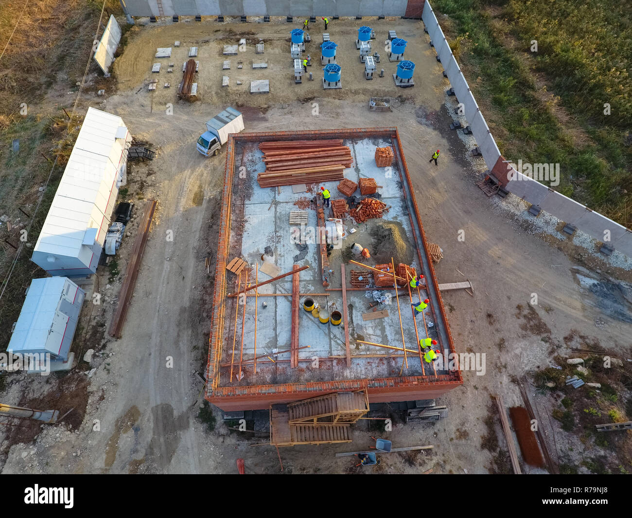 Construction of a brick building. Installation of the roof ...